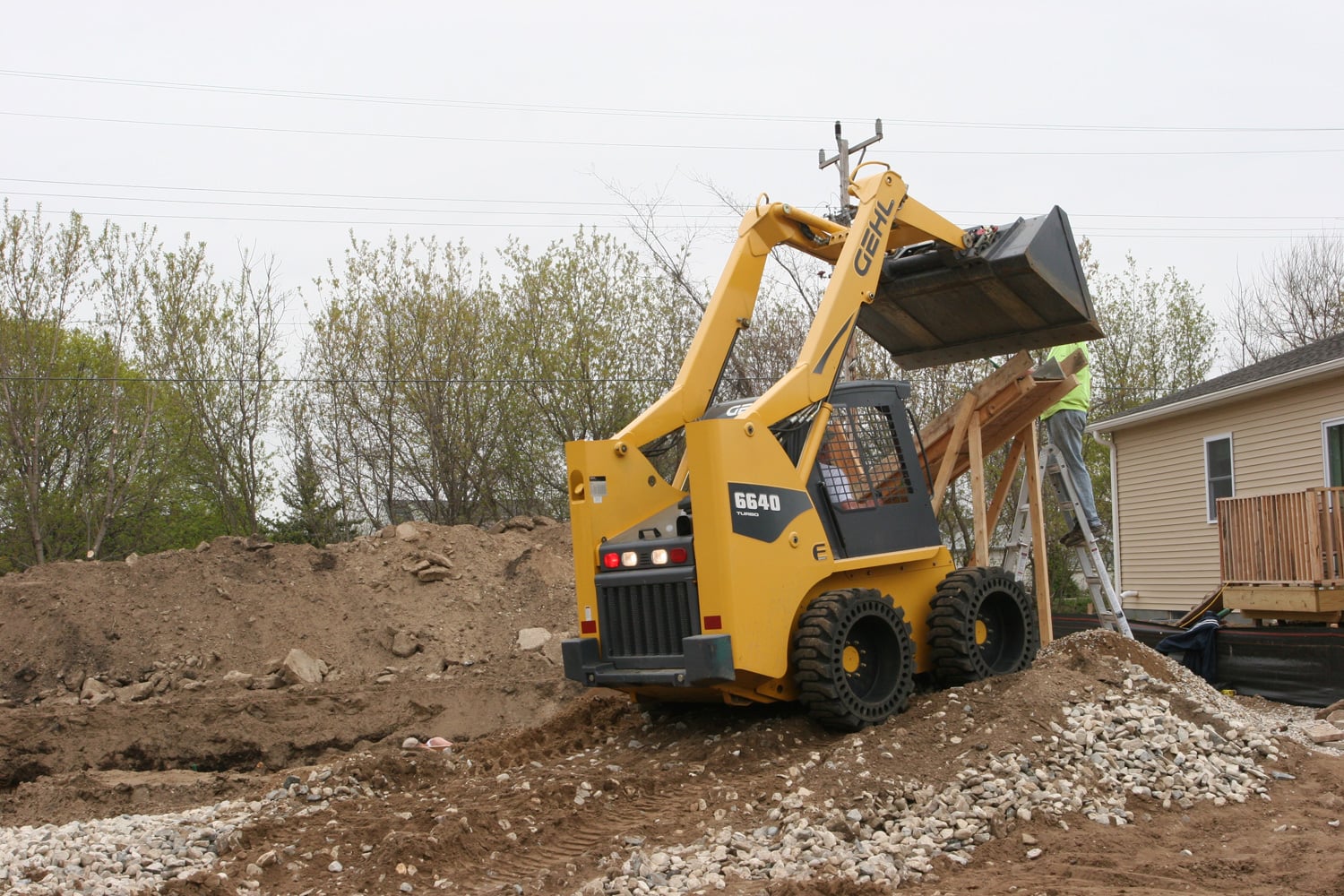 Gehl SL 6640 DXT Skid Steer Specs & Dimensions (2008 - 2015) | LECTURA ...